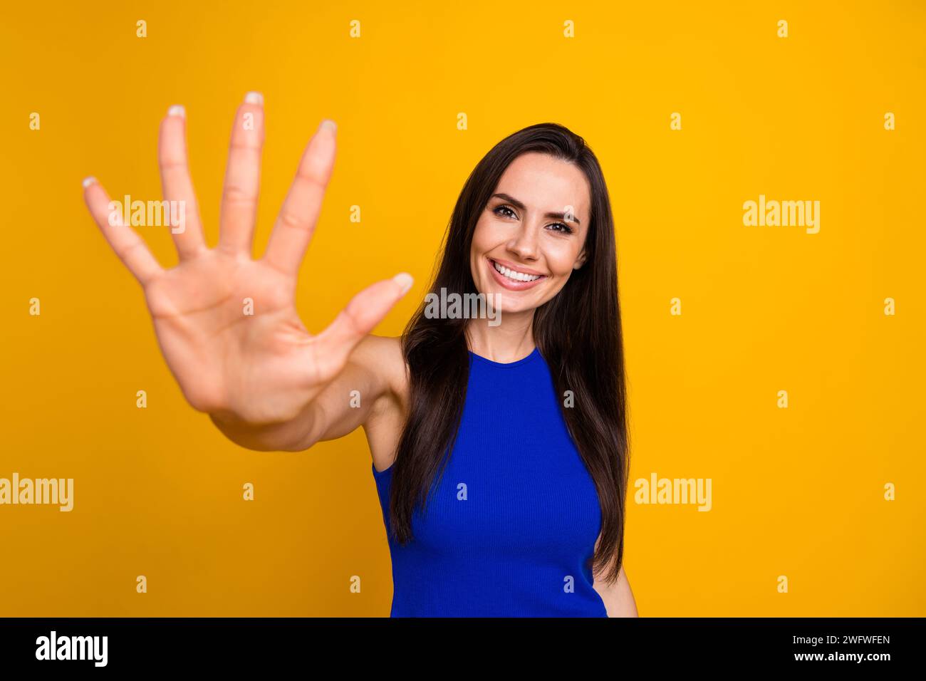 Photo of cheerful excited woman wear blue top showing five fingers ...