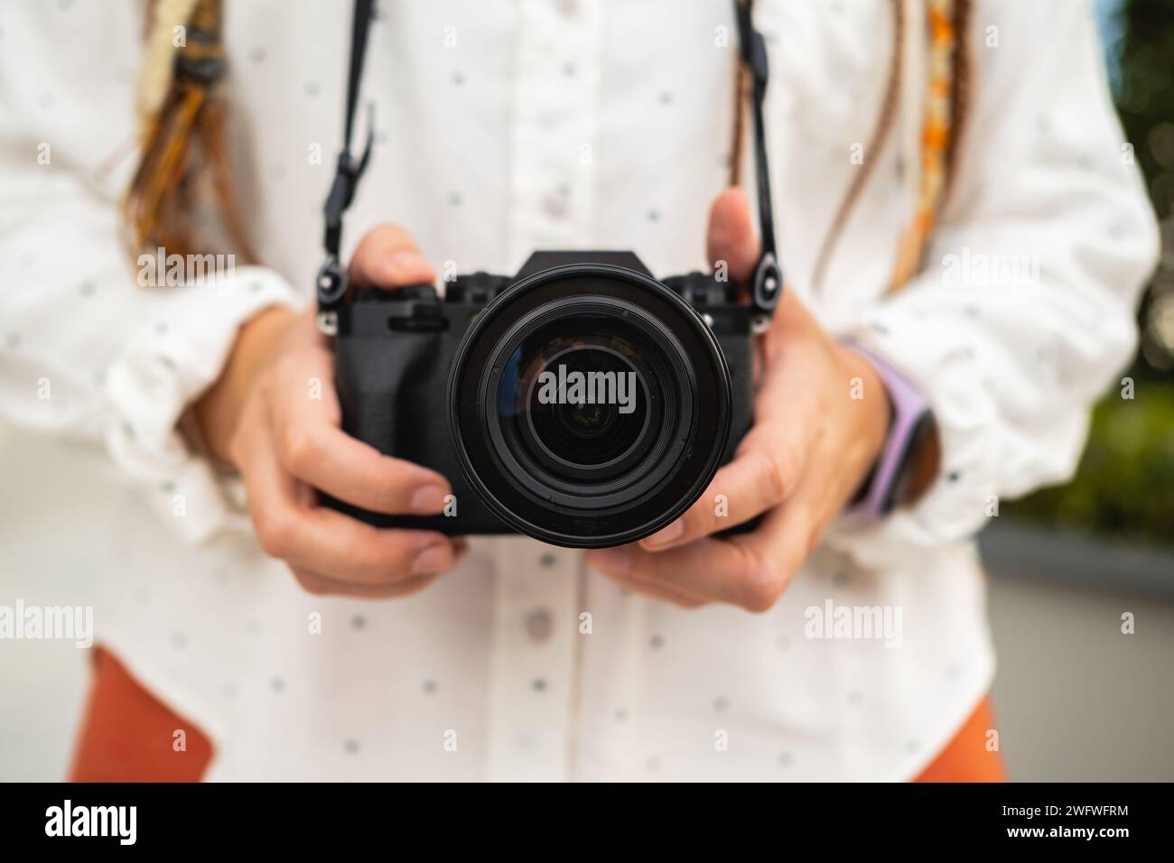 Creative Photographer Holding Camera Stock Photo - Alamy
