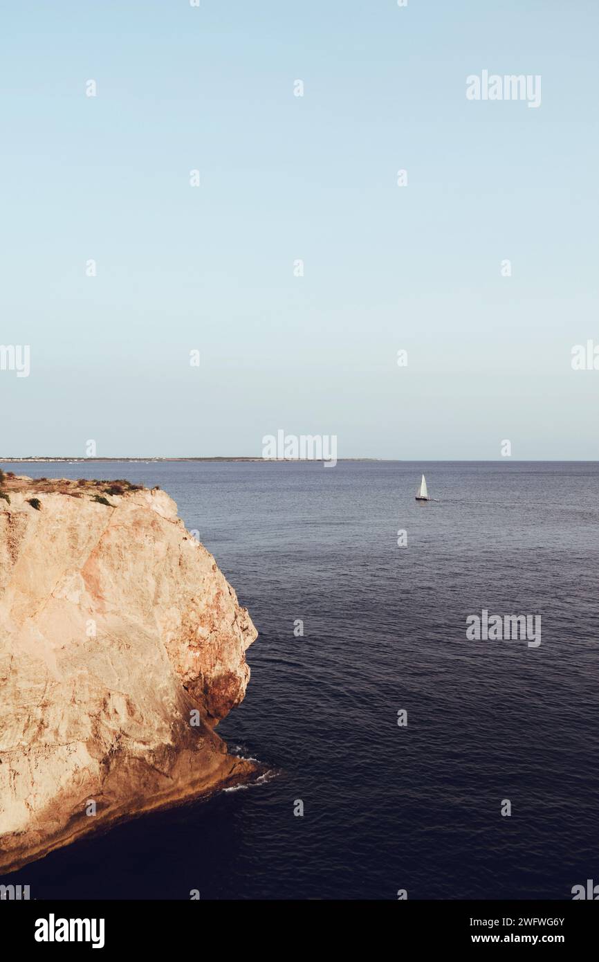 calm and cliffs in Menorca in Spain on August 9, 2021 Stock Photo - Alamy