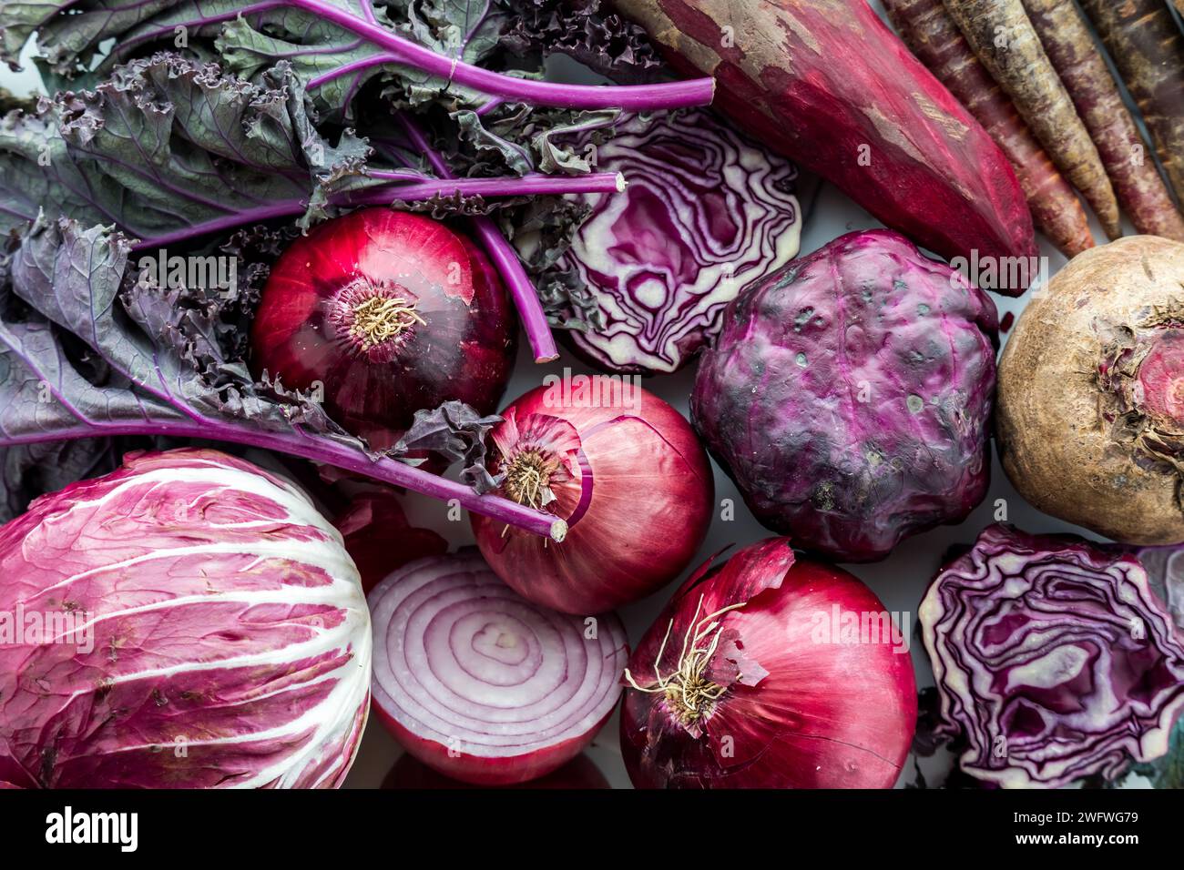 A close up view of an assortment of red and purple vegetables Stock ...