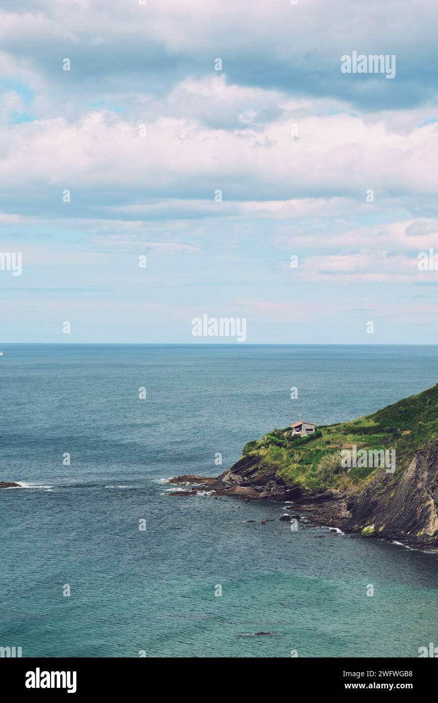 small house located on the cliffs of the Basque country in Spain on ...