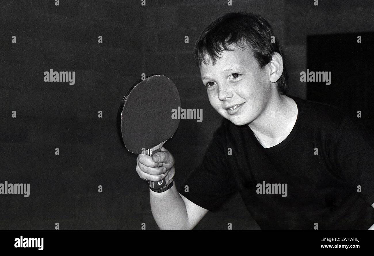 1987, inside an area at a sports centre, a young boy playing table ...