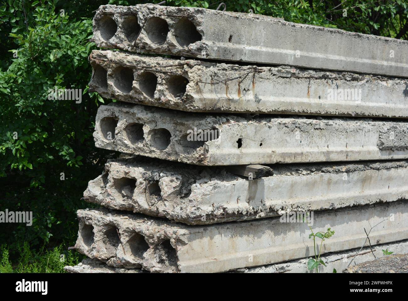 Old grey building materials, a lot of metal cement, concrete building ...