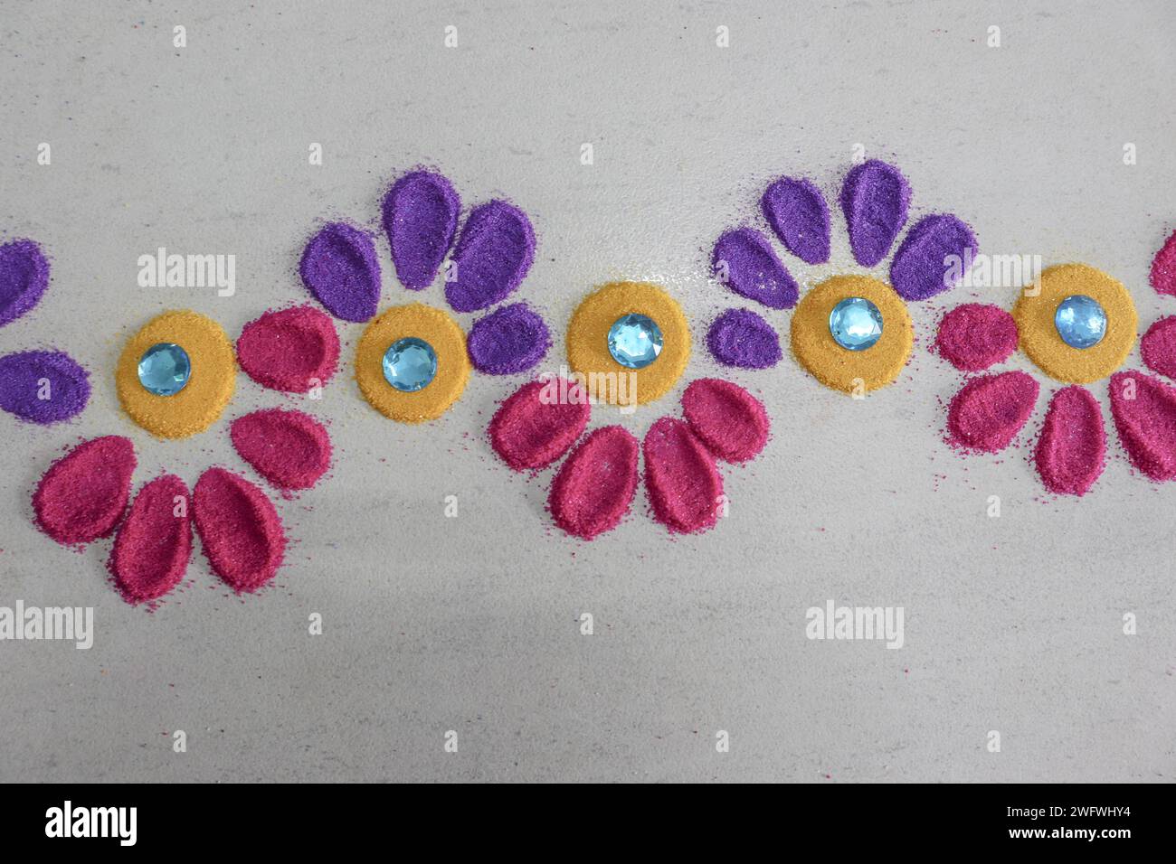 Beautiful multicolored Rangoli design. Border rangolis handmade sand ...