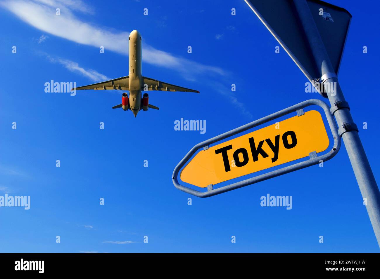 travel destination sign Tokyo with a passenger airplane Stock Photo - Alamy