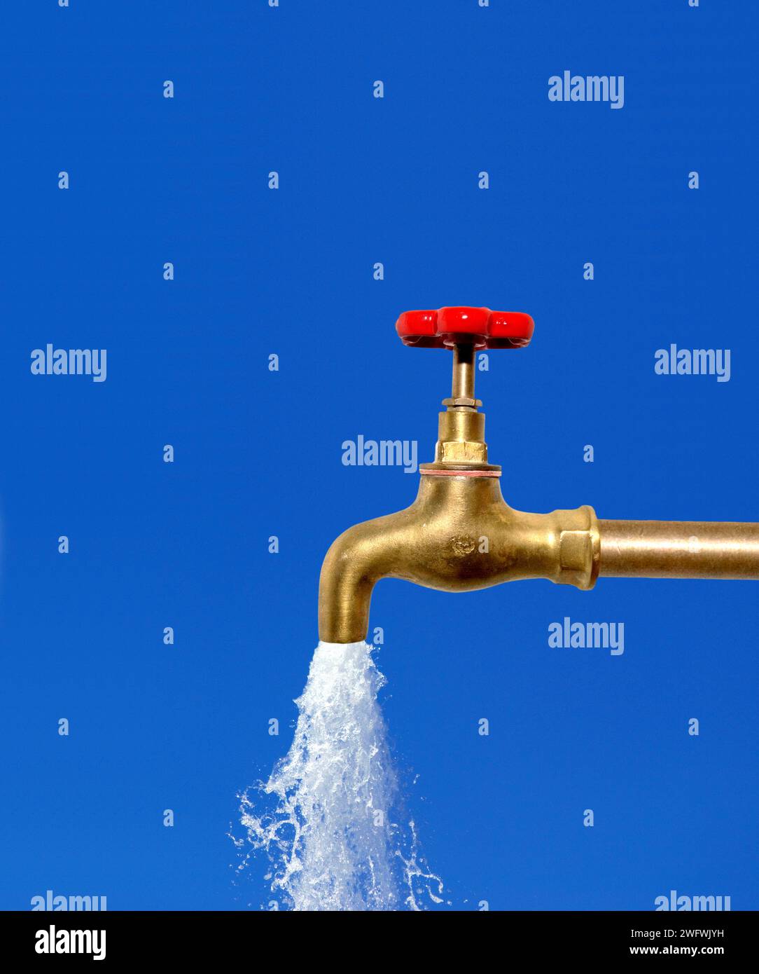 Water runs from a tap Stock Photo - Alamy
