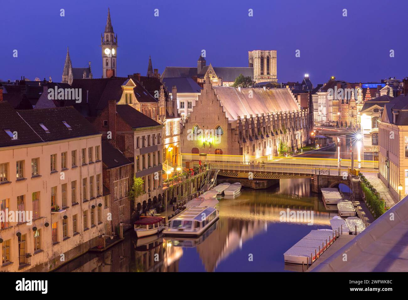 Aerial view of medieval buildings on quay Graslei and Leie river at ...
