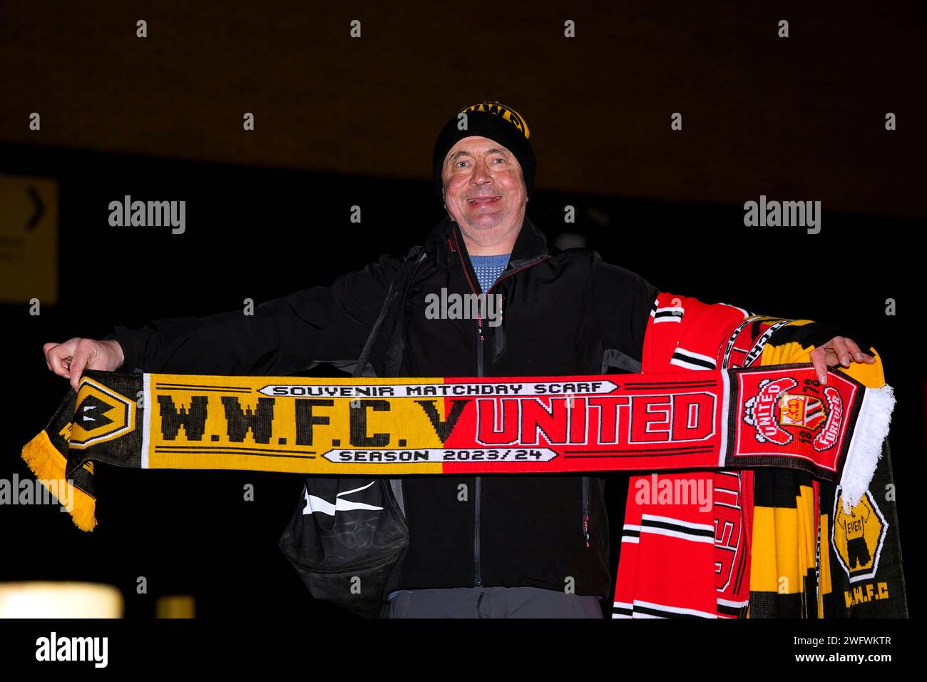 A street vendor selling matchday scarves ahead of the Premier League ...