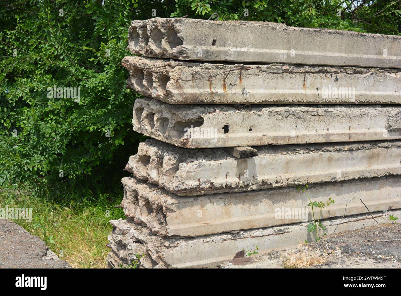 Old grey building materials, a lot of metal cement, concrete building ...