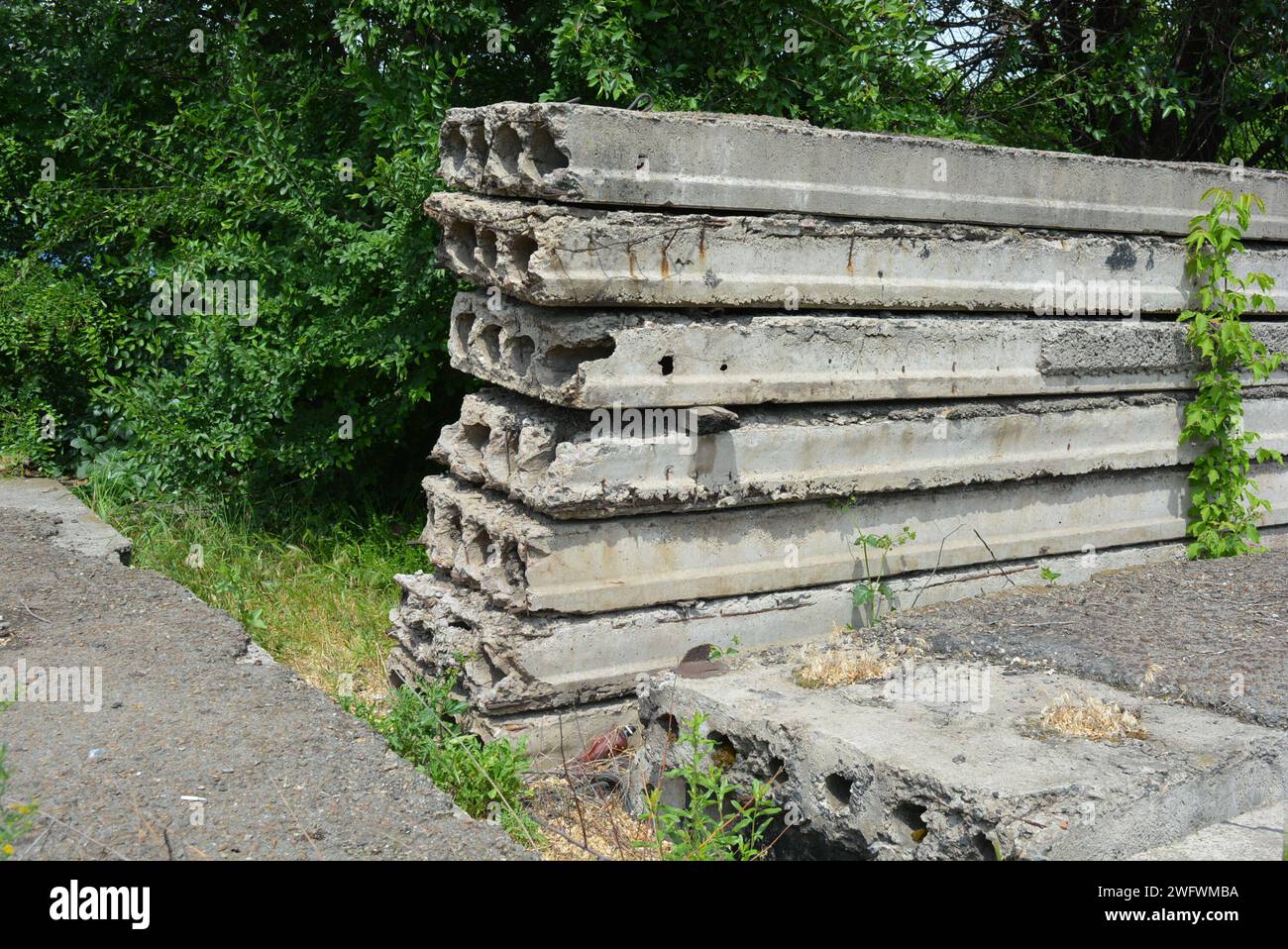 Old grey building materials, a lot of metal cement, concrete building ...