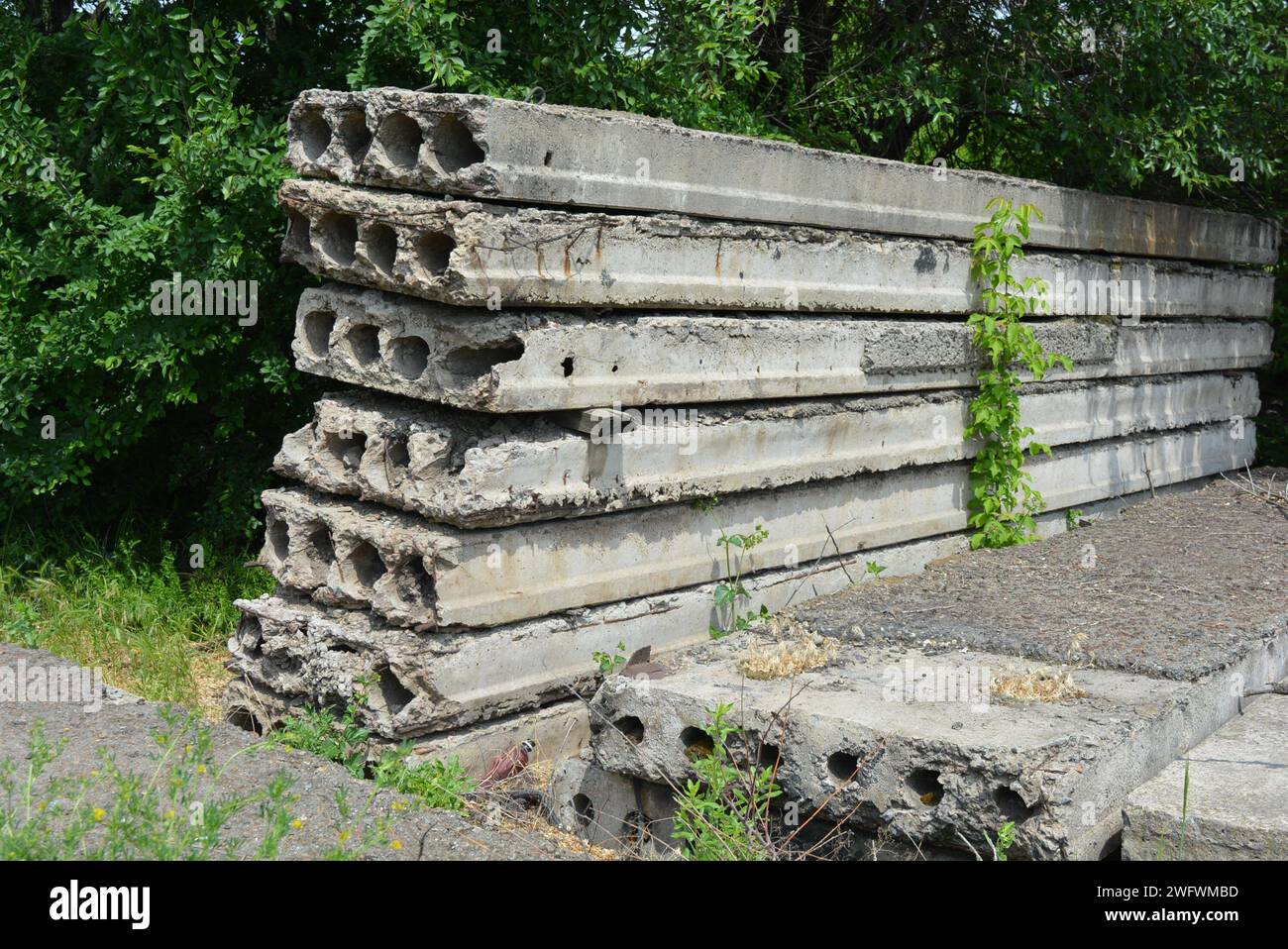 Old grey building materials, a lot of metal cement, concrete building ...