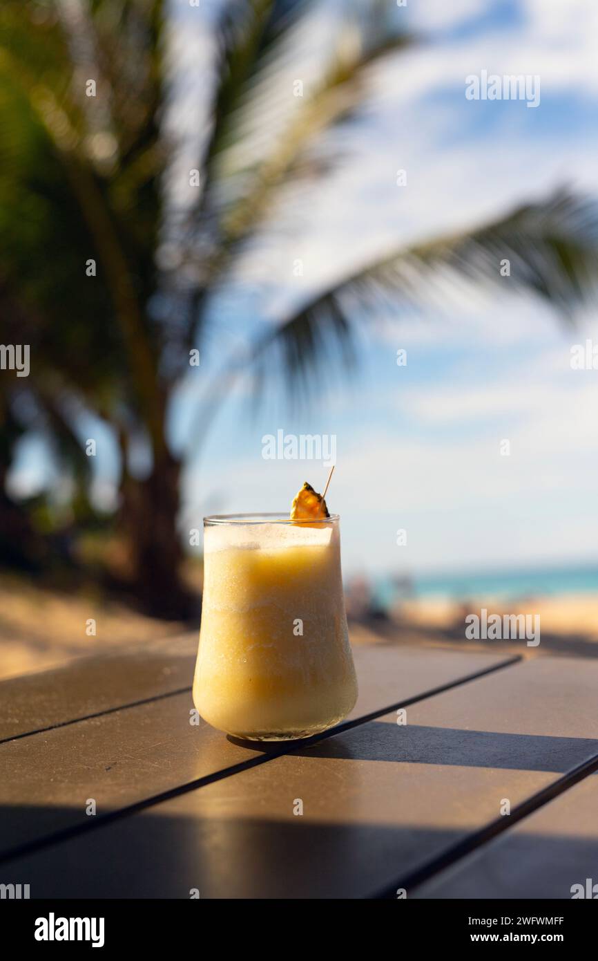 A Pina Colada cocktail on the beach in Puerto Rico Stock Photo - Alamy