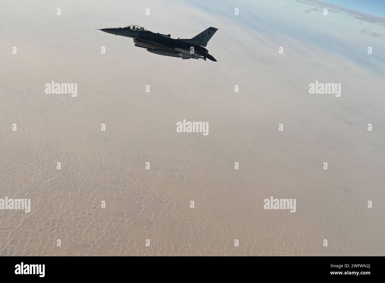 A U.S. Air Force F-16 Fighting Falcon prepares for an aerial refueling ...