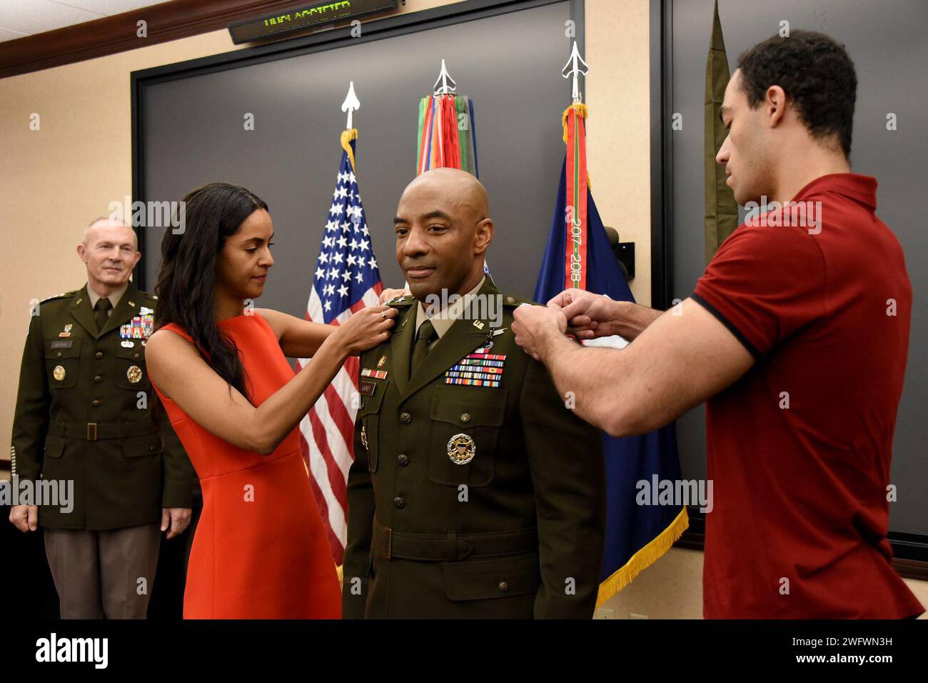 Lt. Gen. Sean A. Gainey receives his third star from his children ...