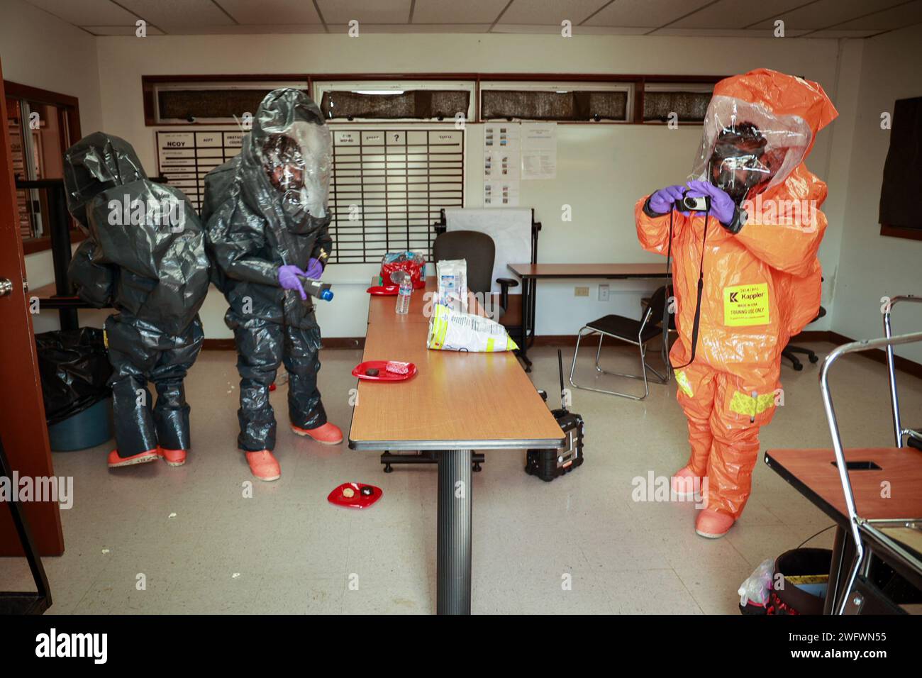 Members of the Guam National Guard’s 94th Civil Support Team survey a ...