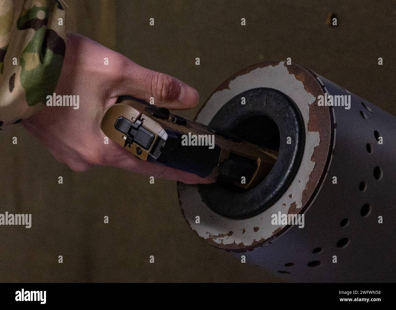 A U.S. Air Force 100th Security Forces Squadron defender clears an M18 ...