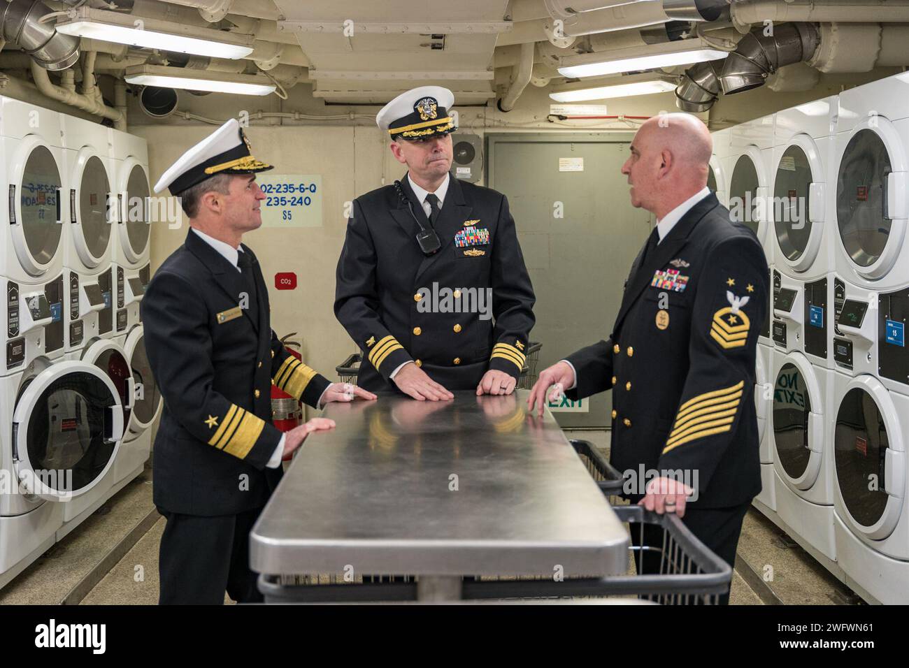 Vice Adm. Doug Perry, commander, U.S. 2nd Fleet, tours the self-service ...