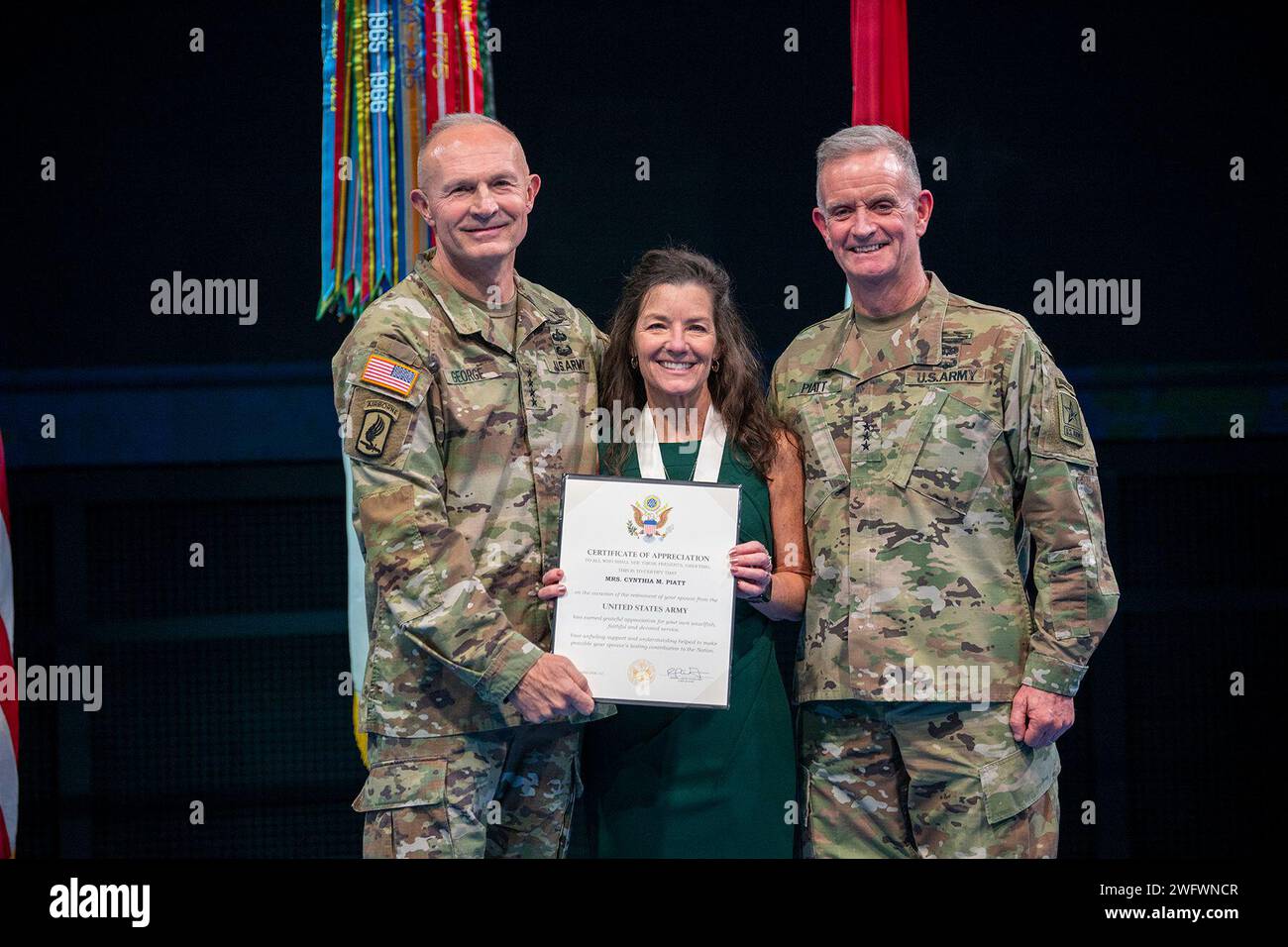 Chief of Staff of the U.S. Army Gen. Randy A. George, left, presents a ...