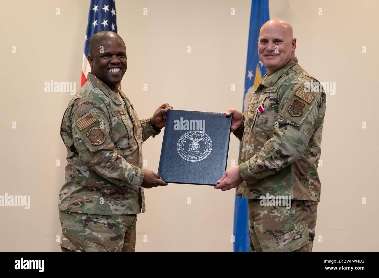 Maj. Mack Fountain, 403rd Force Support Squadron director of operations, presents Senior Master ...