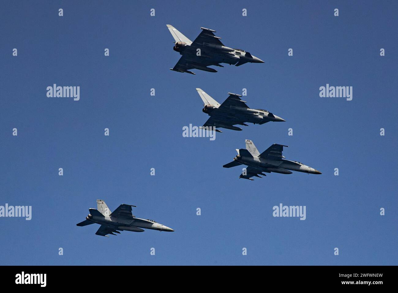 Two British Royal Air Force Eurofighter Typhoons and two F/A-18Es ...