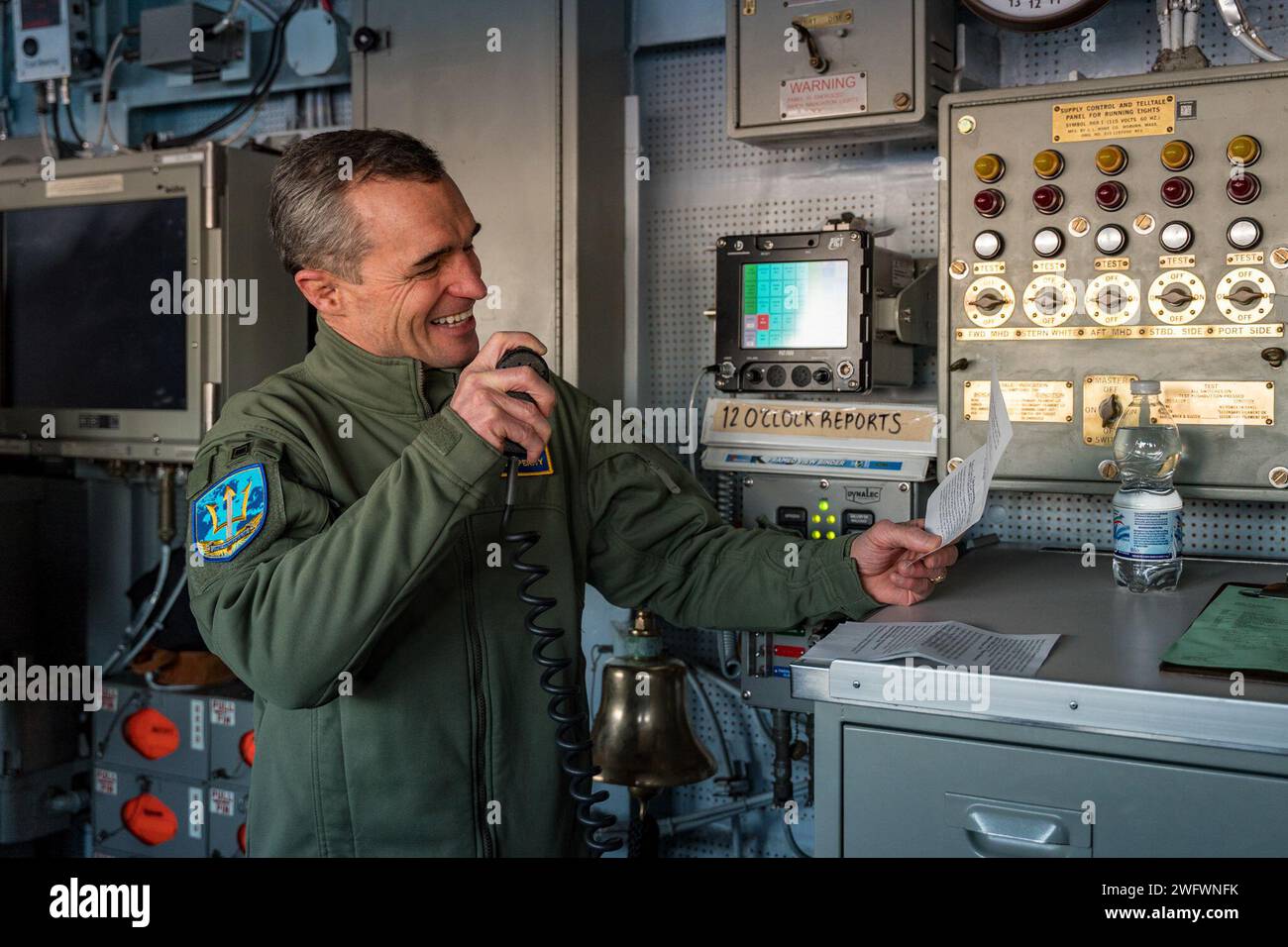 Vice Adm. Doug Perry, commander, U.S. 2nd Fleet, uses the 1MC to ...