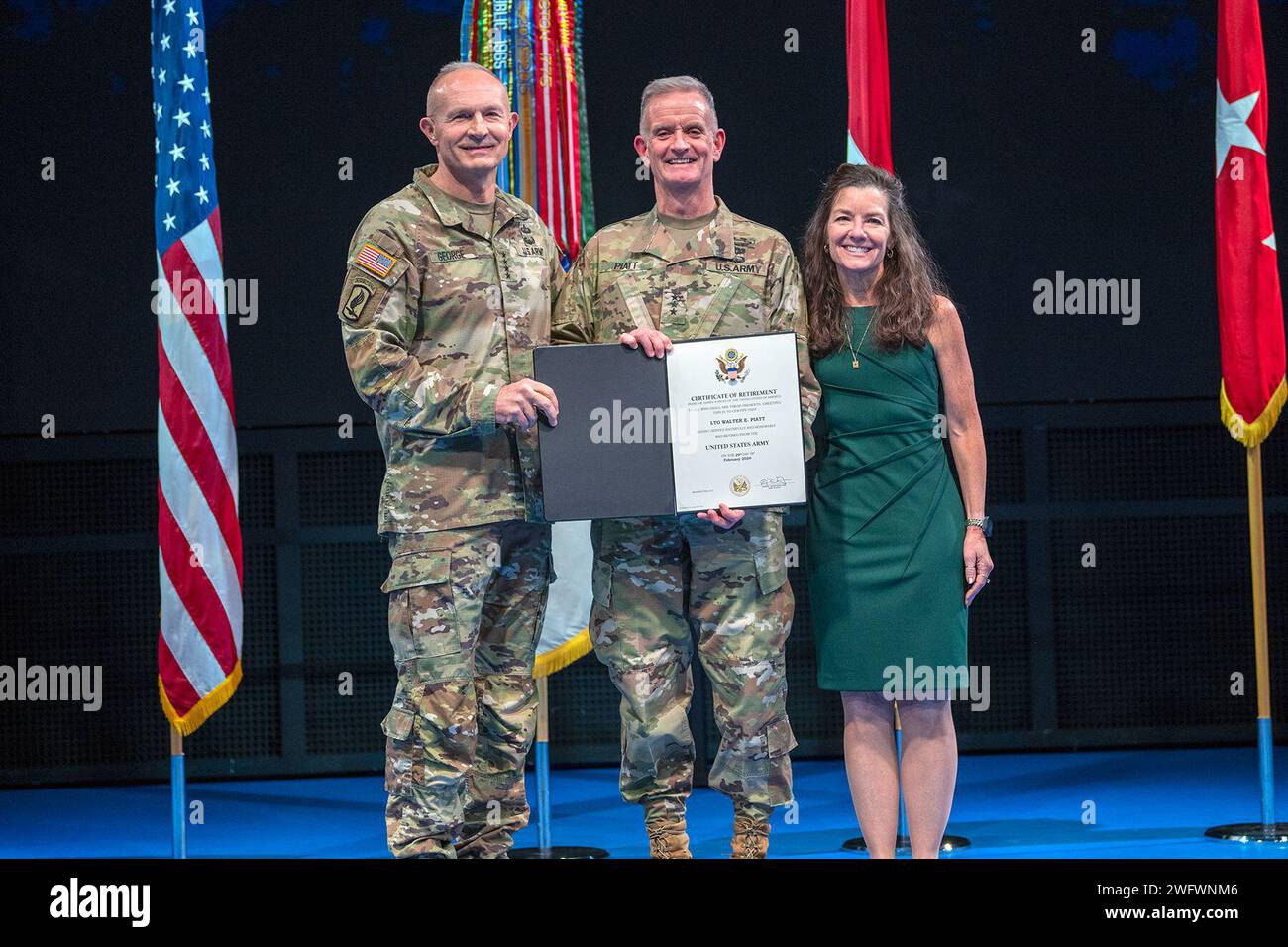 Chief of Staff of the U.S. Army Gen. Randy A. George, left, presents a ...