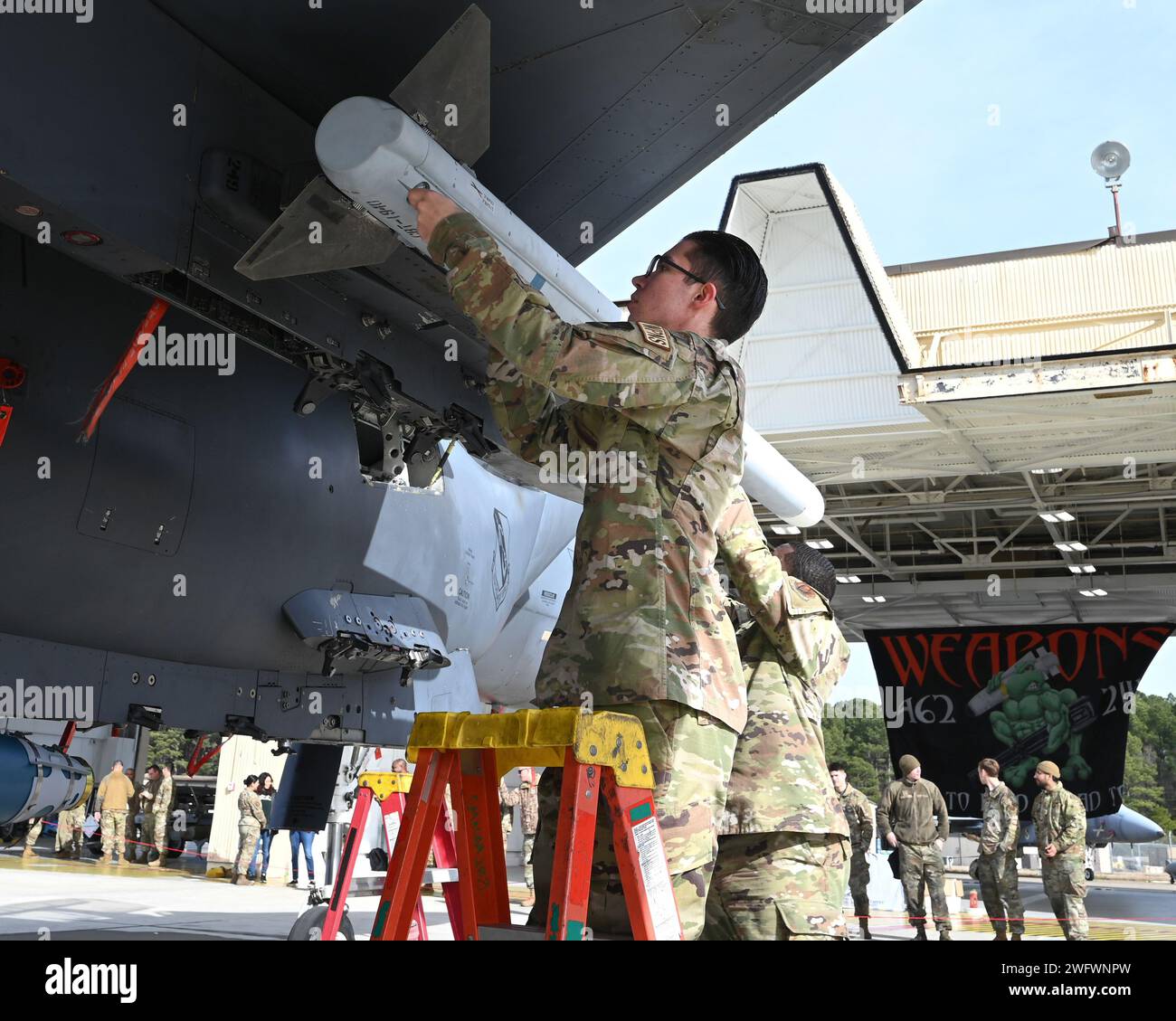 U.S. Air Force Airman 1st Class Andrew Davis, a weapons load crew ...