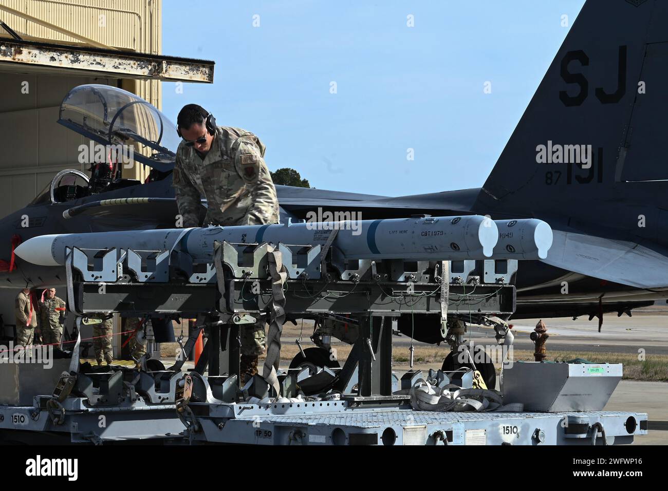 U.S. Air Force Staff Sgt. Jovany Rodriguez, a weapons load crew team ...