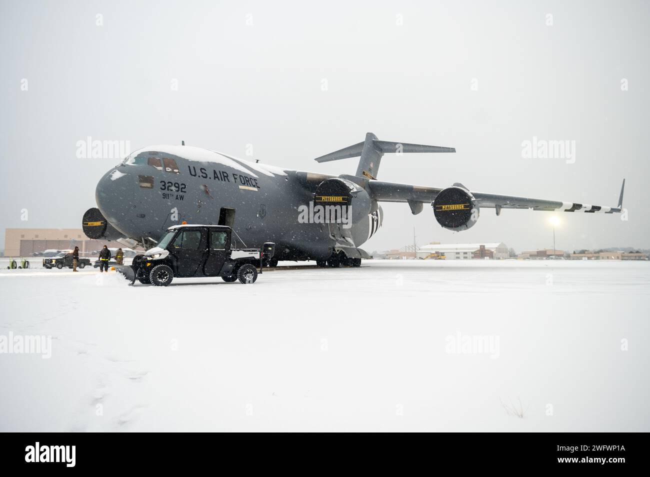 911th Aircraft Maintenance Squadron Steel Airmen perform snow clearing ...