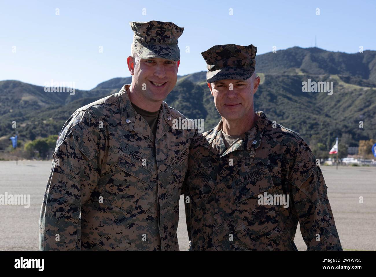 U.S. Marine Corps Lt. Col. Bart P. Lambert, right, the outgoing ...