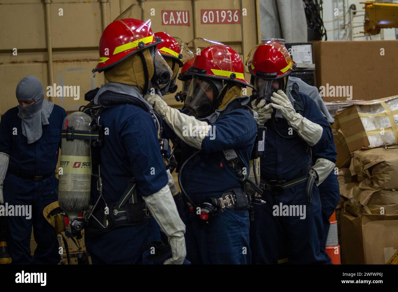 PACIFIC OCEAN (Jan. 18, 2024) U.S. Sailors put on protective ...