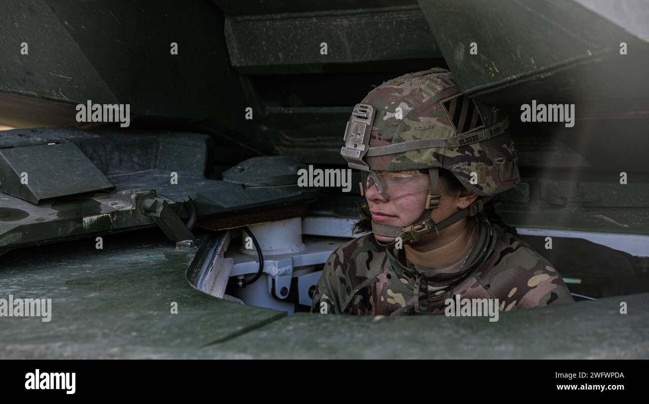 U.S. Army Pvt. Samantha Lomartire, a tank operator assigned to 3rd ...