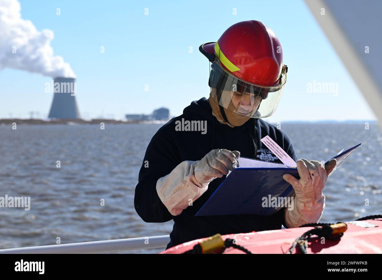 Petty Officer 1st Class Christopher Vullo acts as the on-scene-leader ...