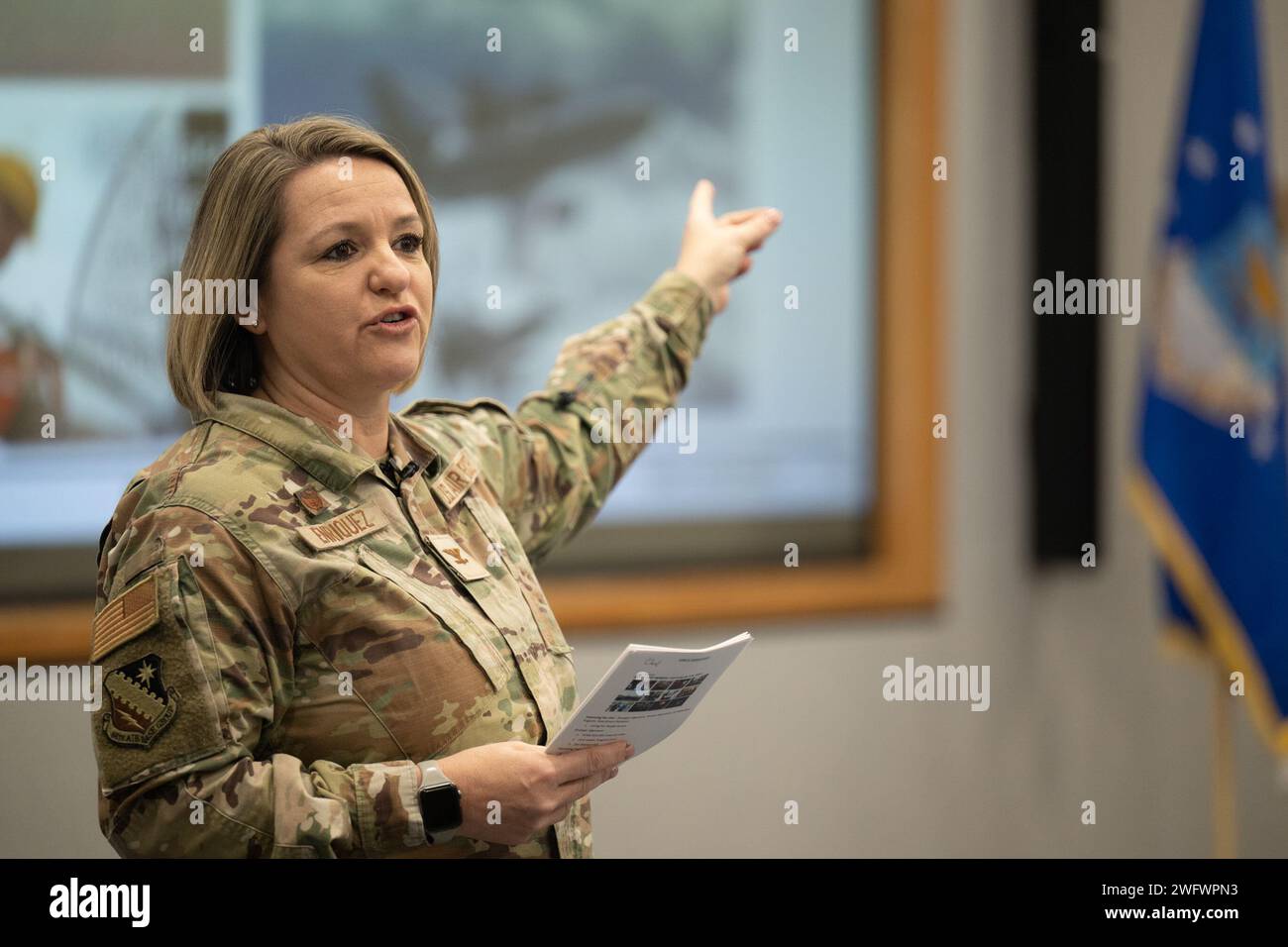 Col. Taona Enriquez, 66th Air Base Group commander, speaks to members ...