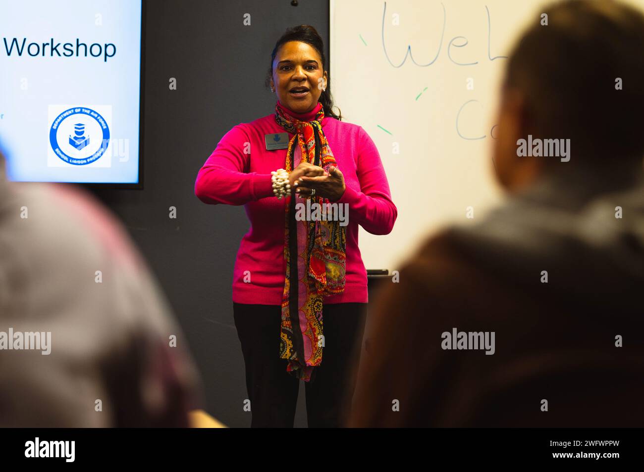 Stacey Holland, 56th Force Support Squadron school liaison program manager, briefs at a military ...