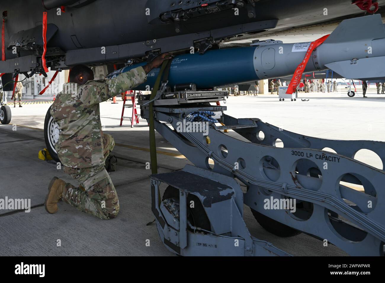 U.S. Air Force Senior Airman Justice McCray, a weapons load crew team ...