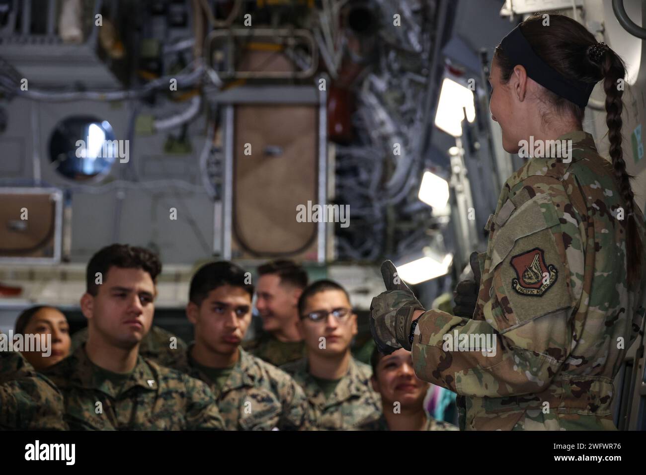 U.S. Air Force Staff Sgt. Jo Besse, a C-17 Globemaster III load master ...