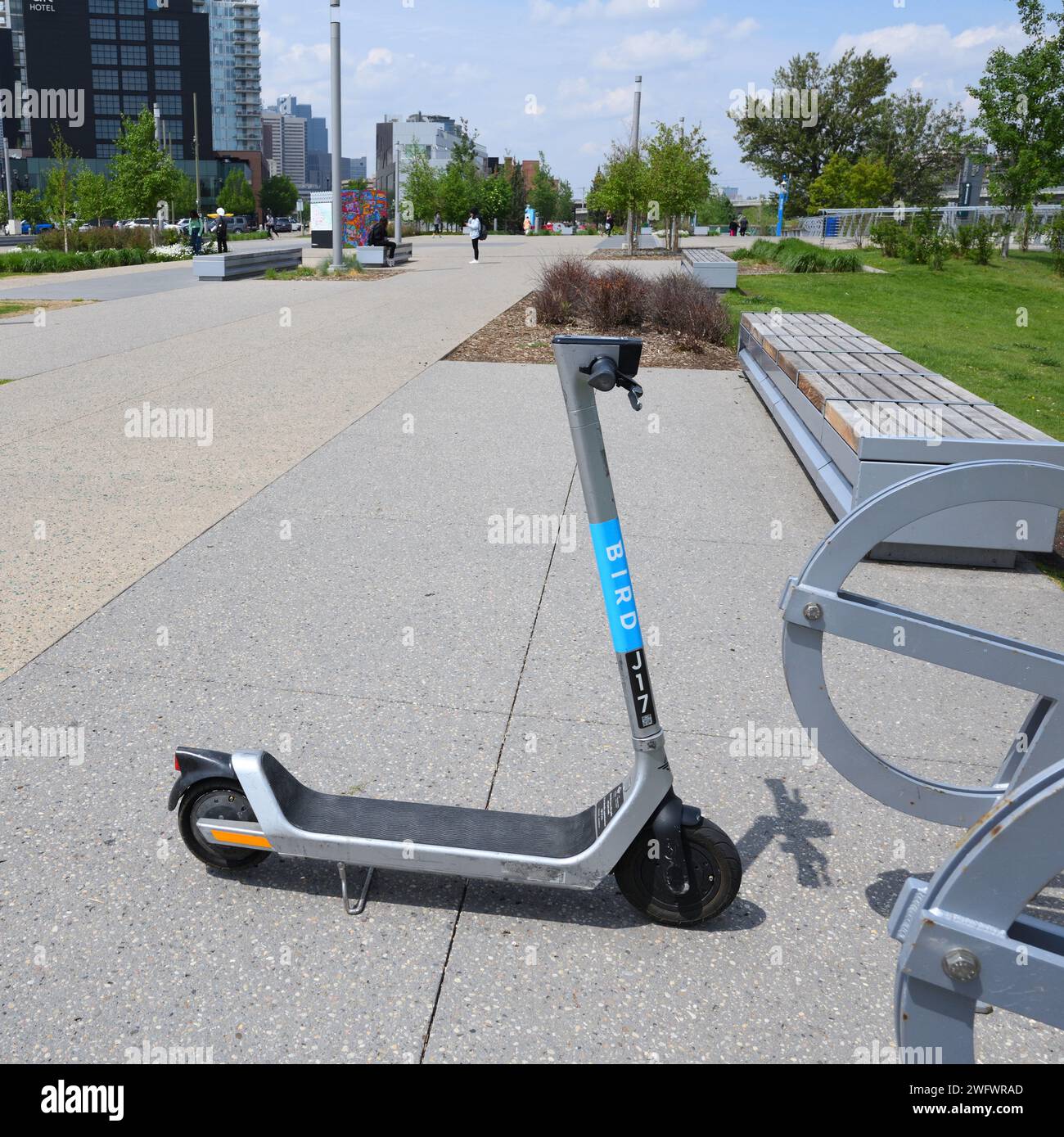 An e-Scooter next to Calgary walkway and cycle route into the city in ...