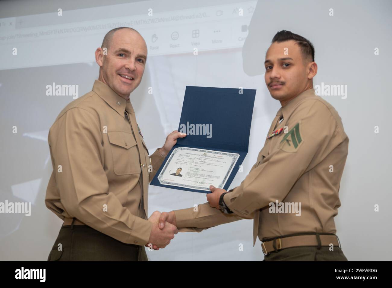 U.S. Marine Corps Col. Kyle Shoop, left, the commanding officer of ...