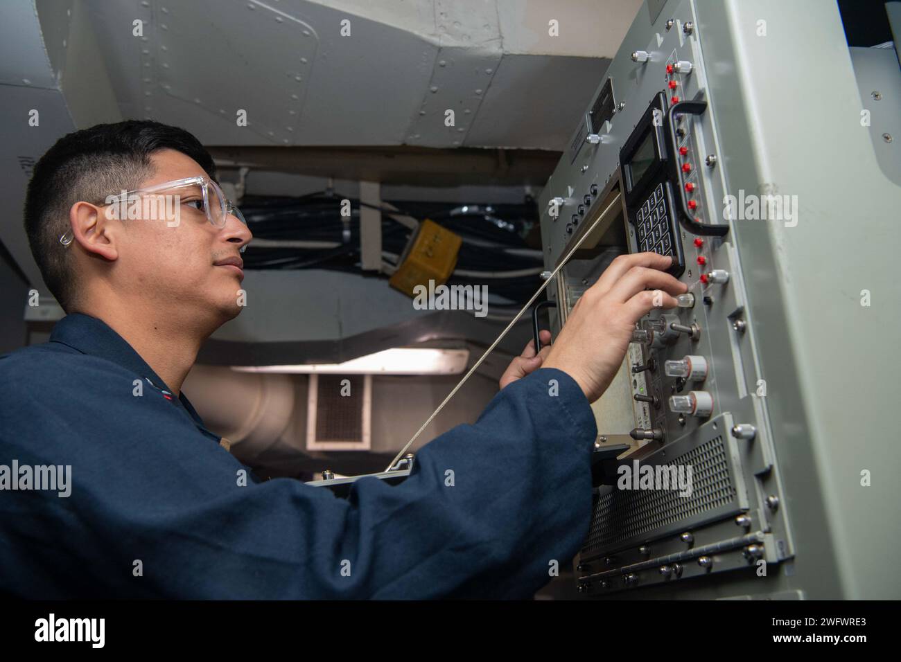 Electronics Technician 2nd Class Javier Varela, a native of San Pedro ...