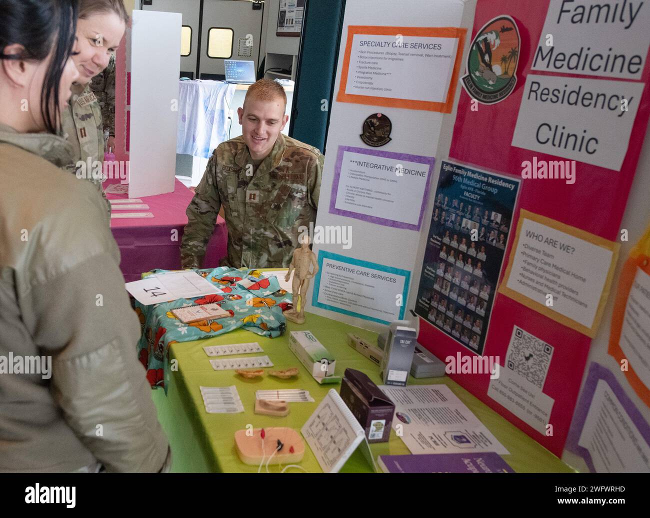Military members gather around the Family Medicine Residency Clinic ...