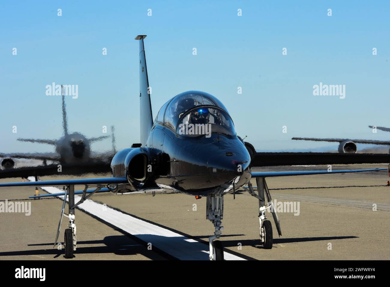 A U.S. Air Force T-38 Talon from the 1st Reconnaissance Squadron, left ...