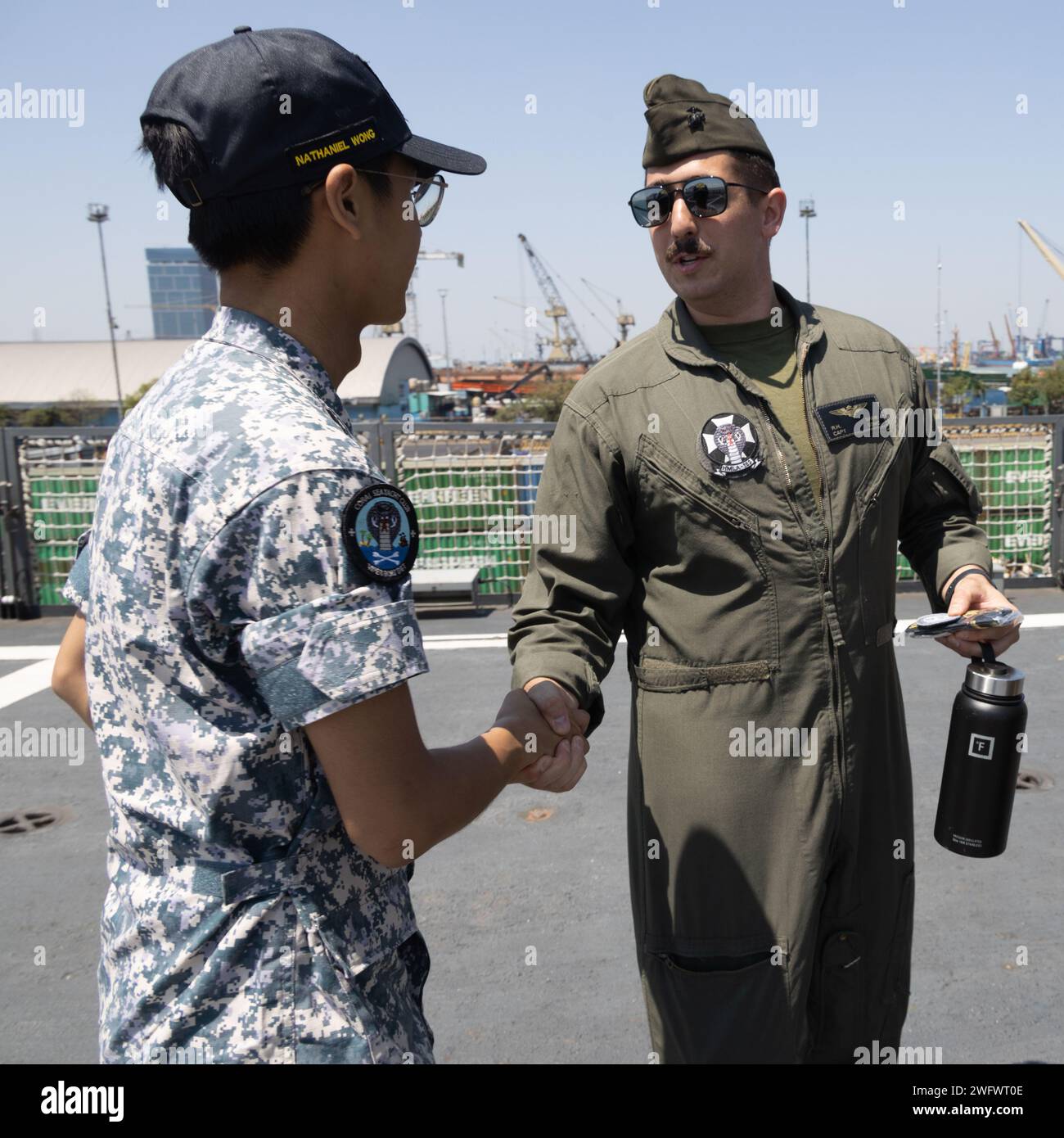 Republic of Singapore Navy Military Expert 1-1 Nathaniel Wong, left ...