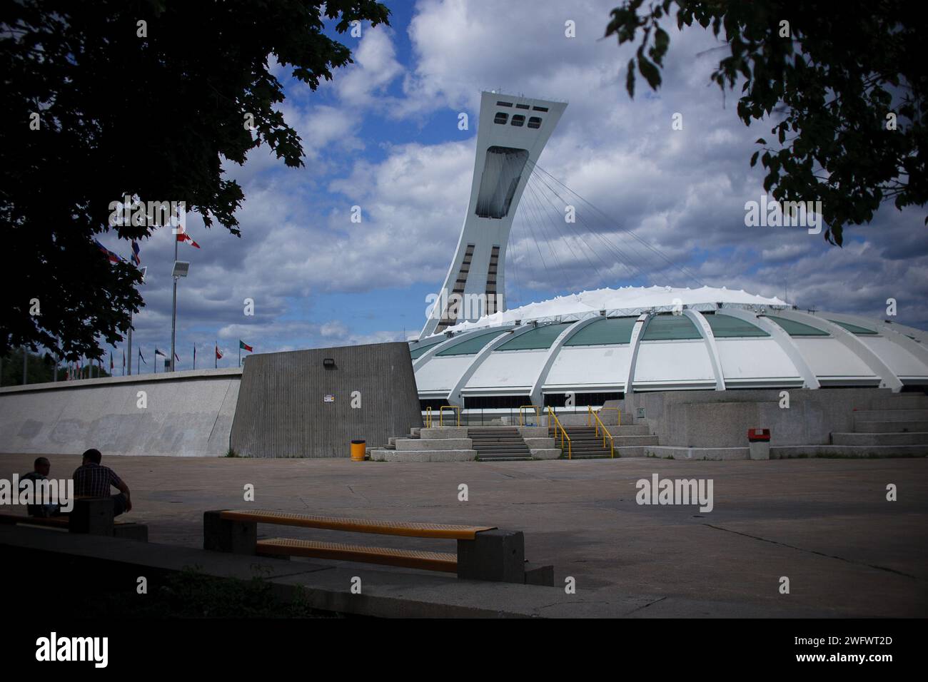 People walk past the Olympic Stadium in Montreal, Quebec, Canada Stock ...