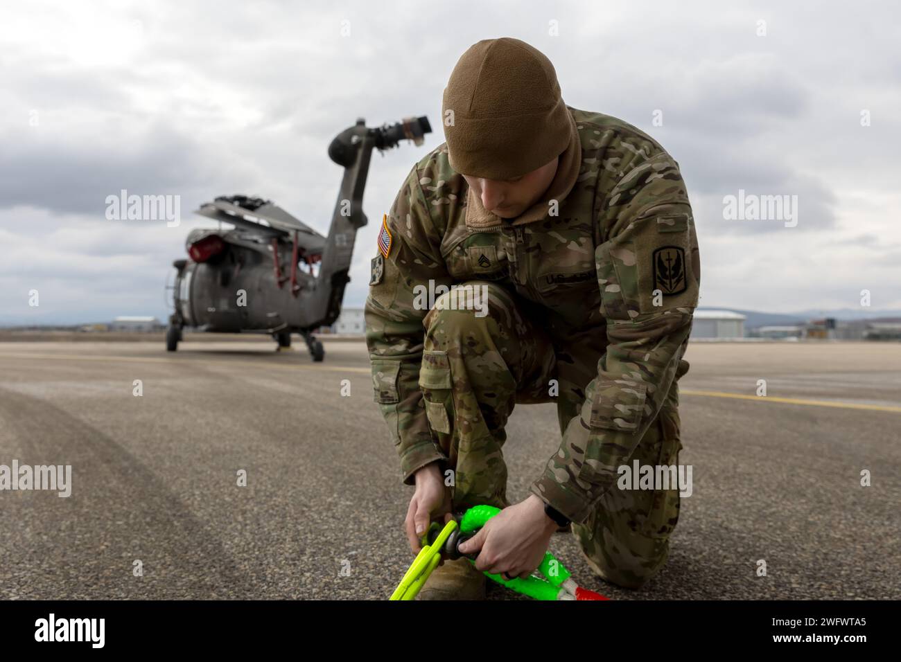 Members of 1st Battalion, 126th Aviation Regiment retrograde nine UH-60 ...