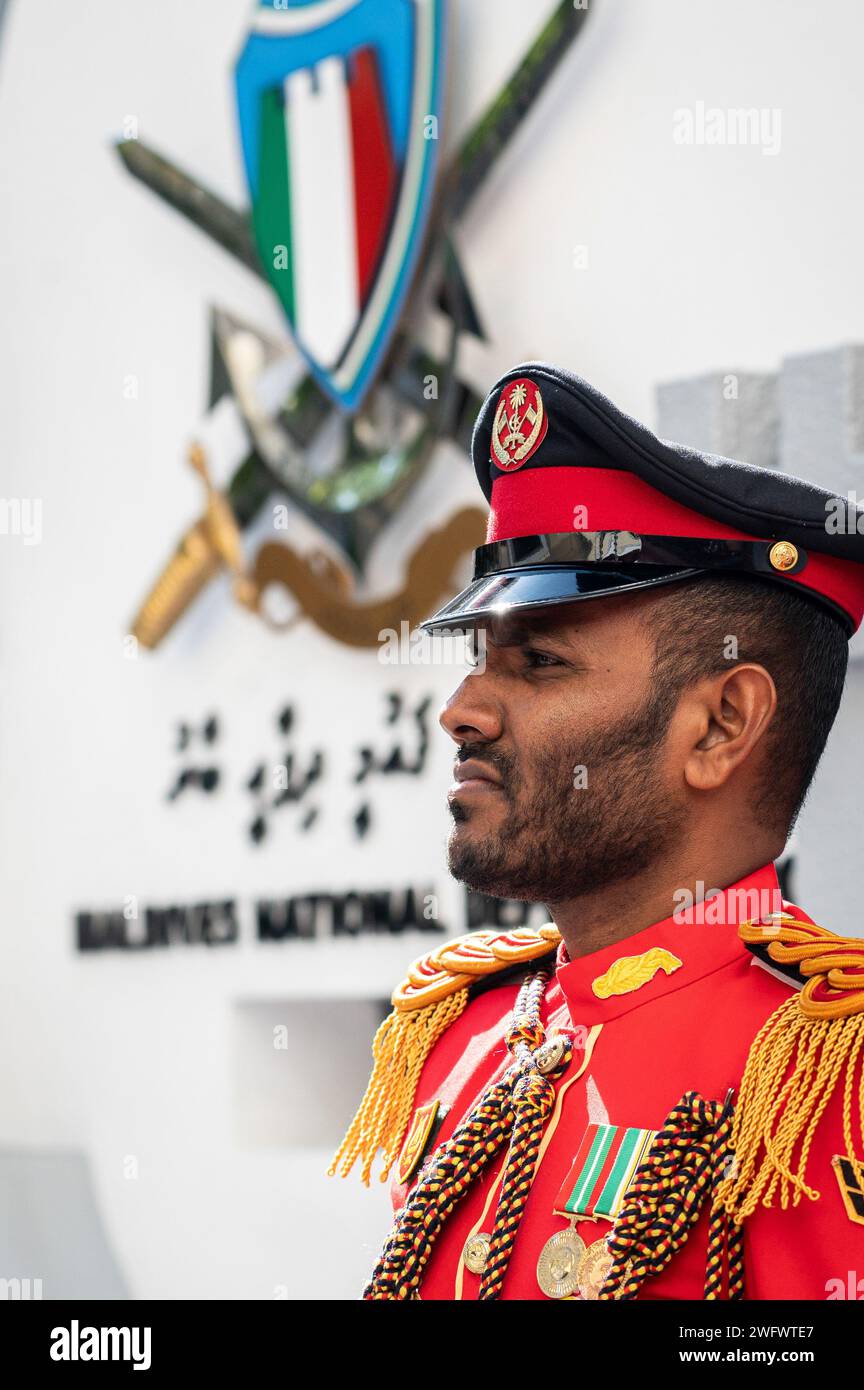 A member of the Maldives National Defence Forces (MNDF) stands at ...