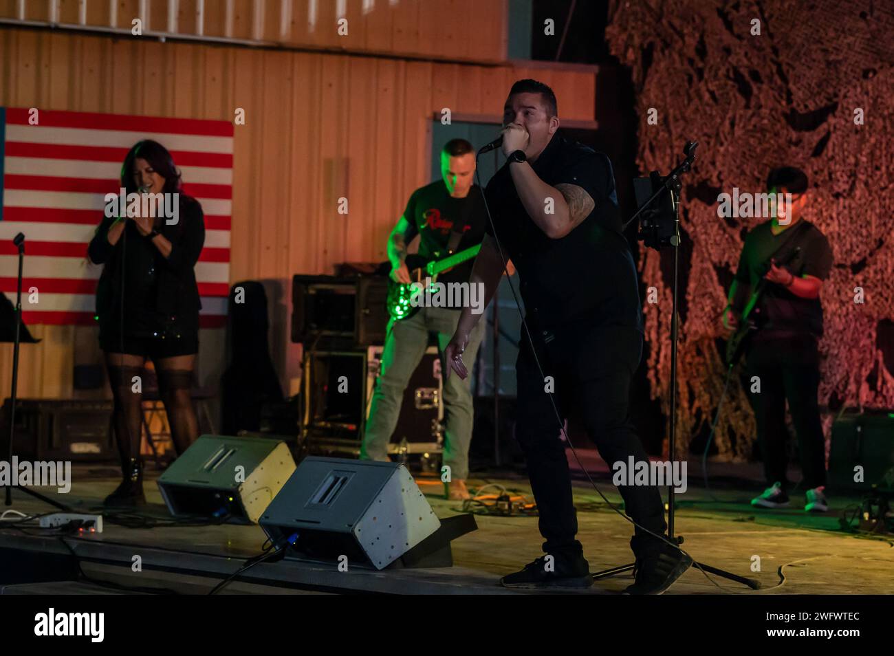 U.S. Air Force and Army service members play music during a live ...