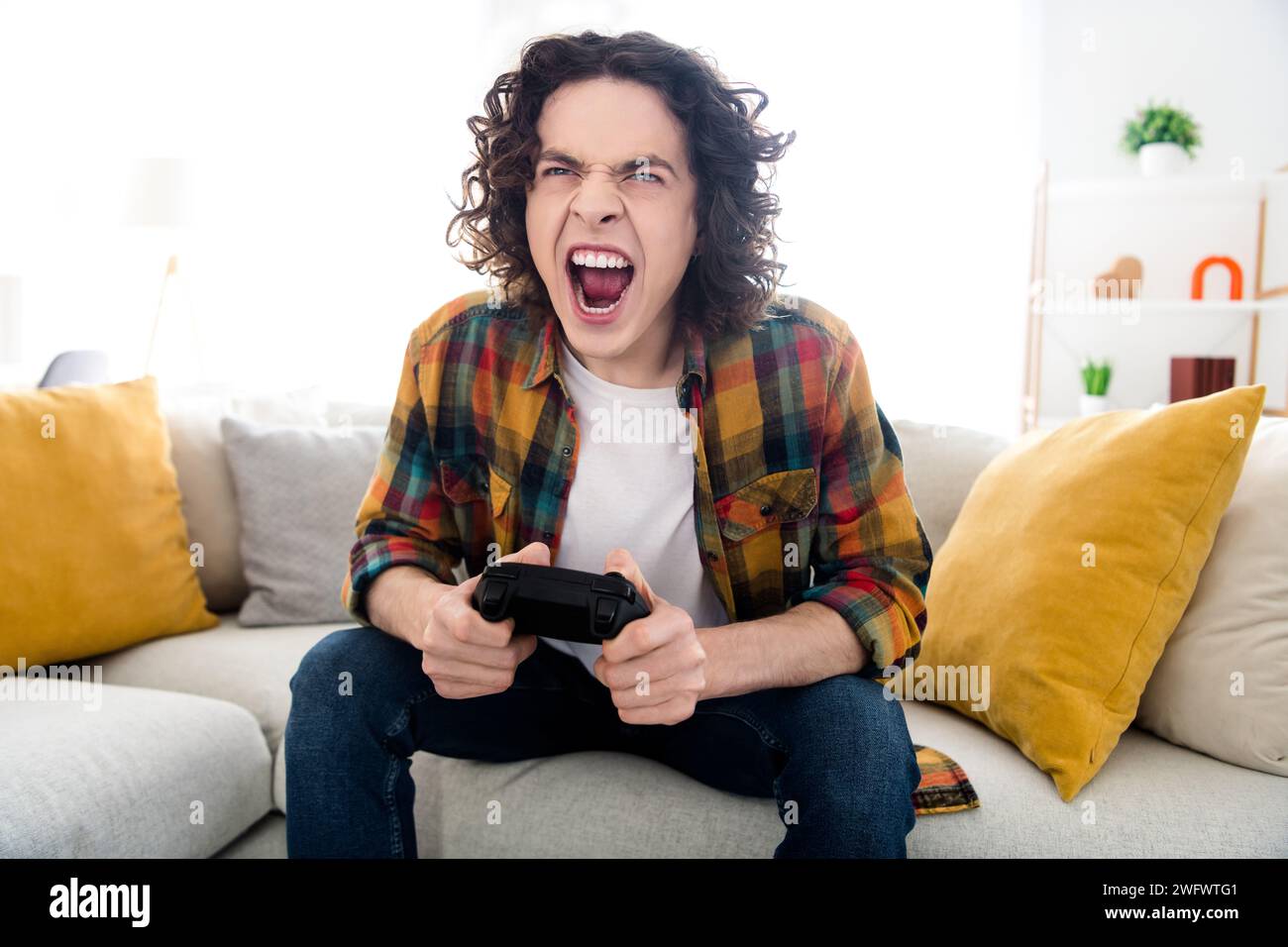 Photo of angry loosing guy dressed checkered shirt screaming loosing ...