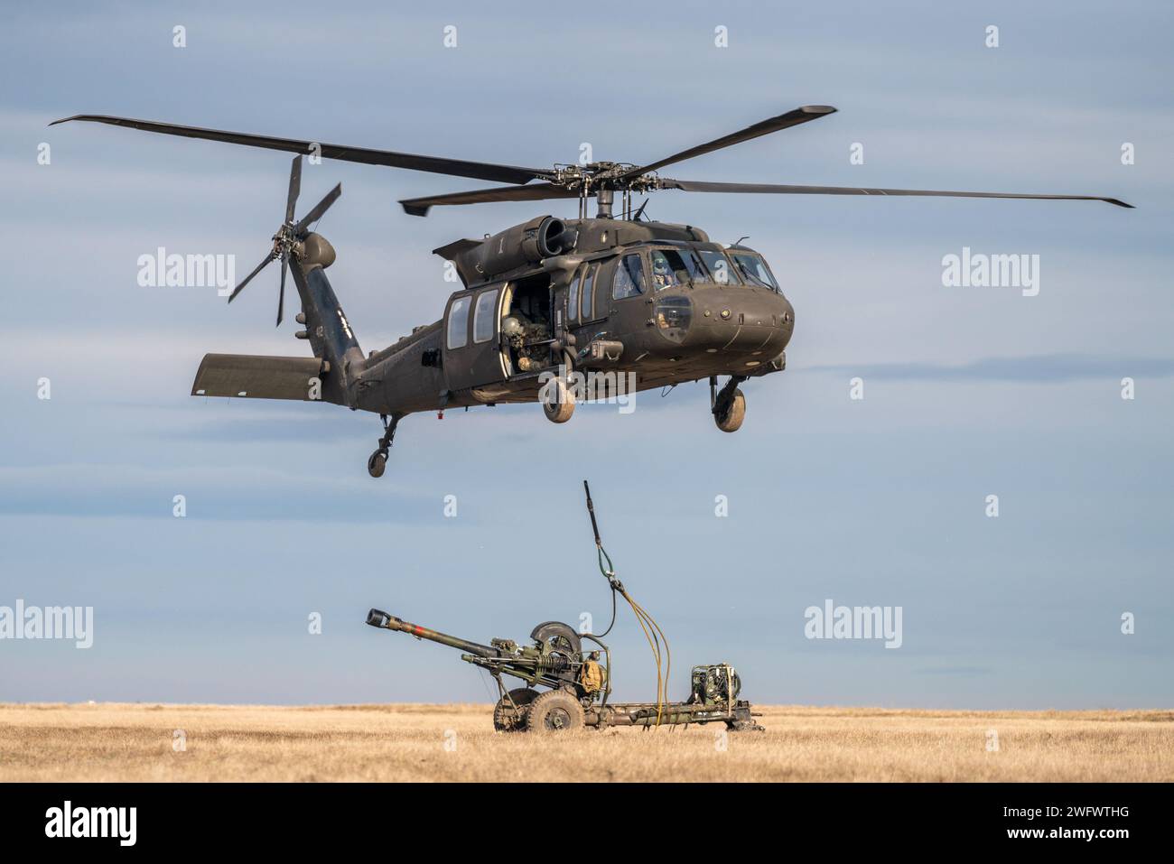 Artillery soldiers with Bravo Battery, 3rd Battalion, 320th Field Artillery Regiment, 3rd ...