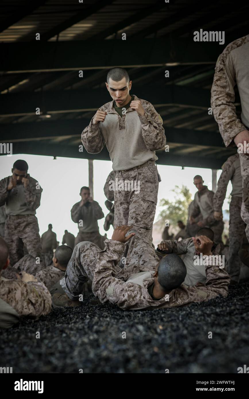 Recruits with Kilo Company, 3rd Recruit Training Battalion, execute tan ...